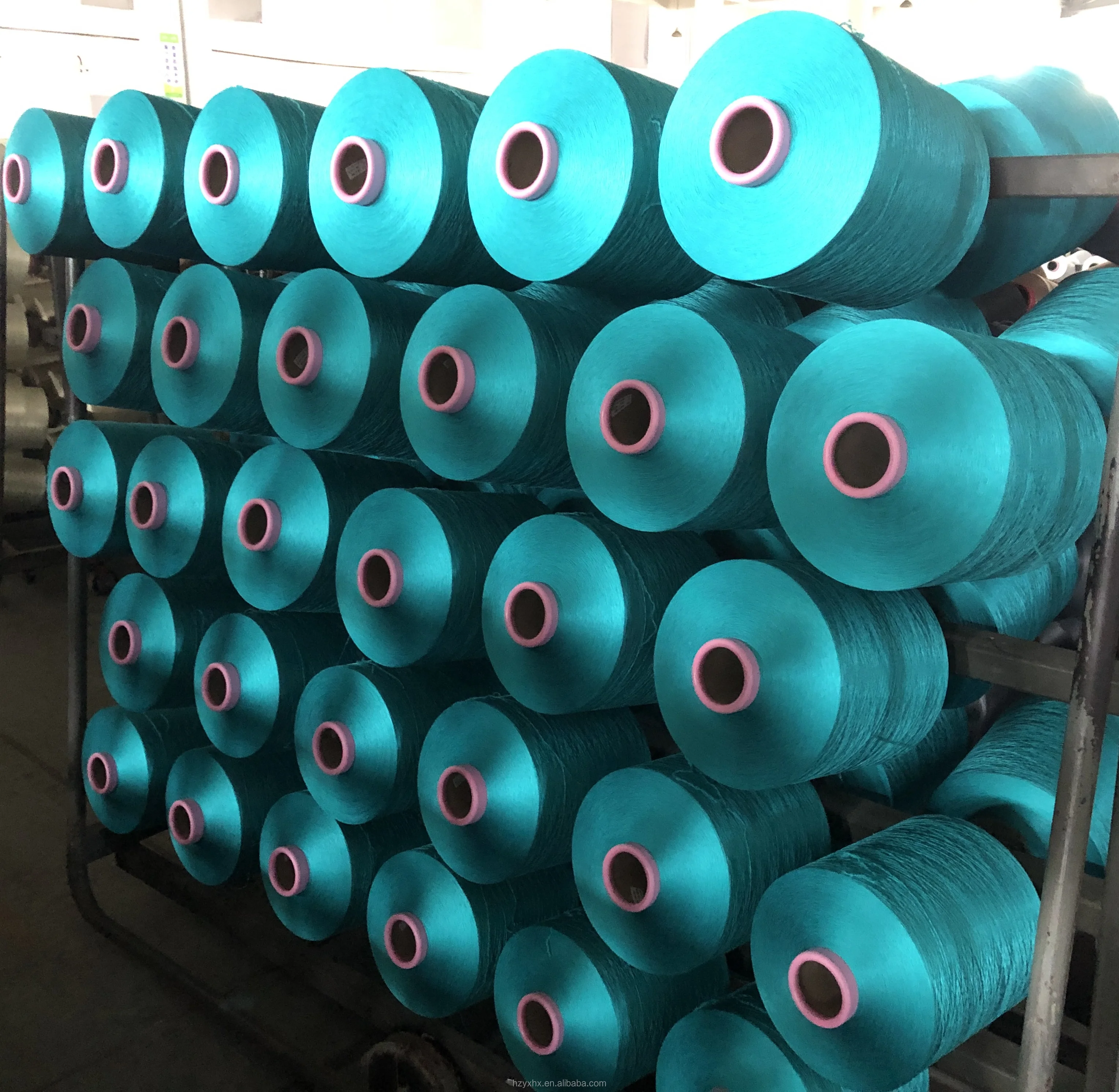 Полиэфирная окрашенная пряжа DTY 150D/48F - купить оптом